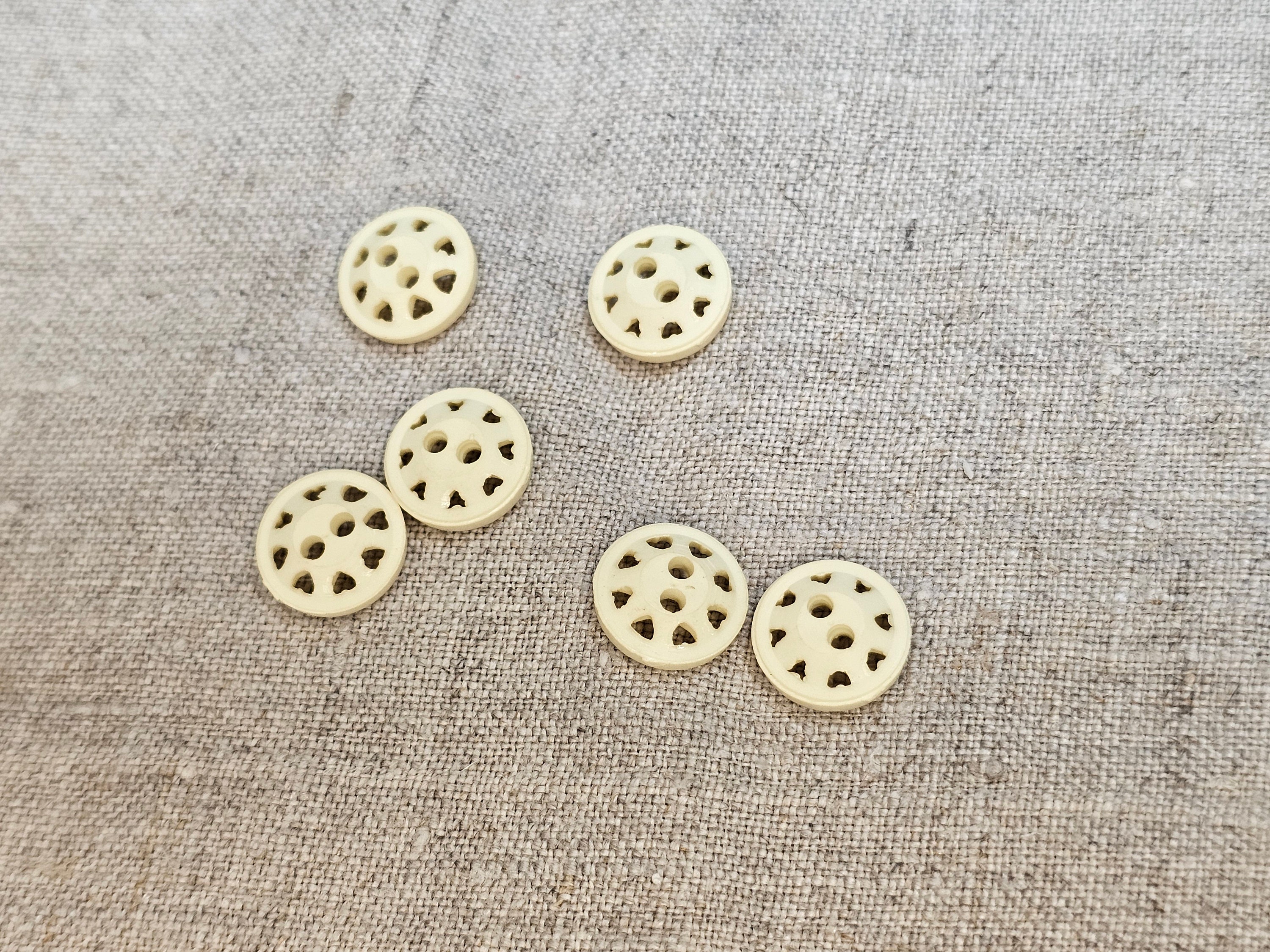 Adorable Cream Colored Plastic Buttons, Round, Pierced With Tiny Hearts ...