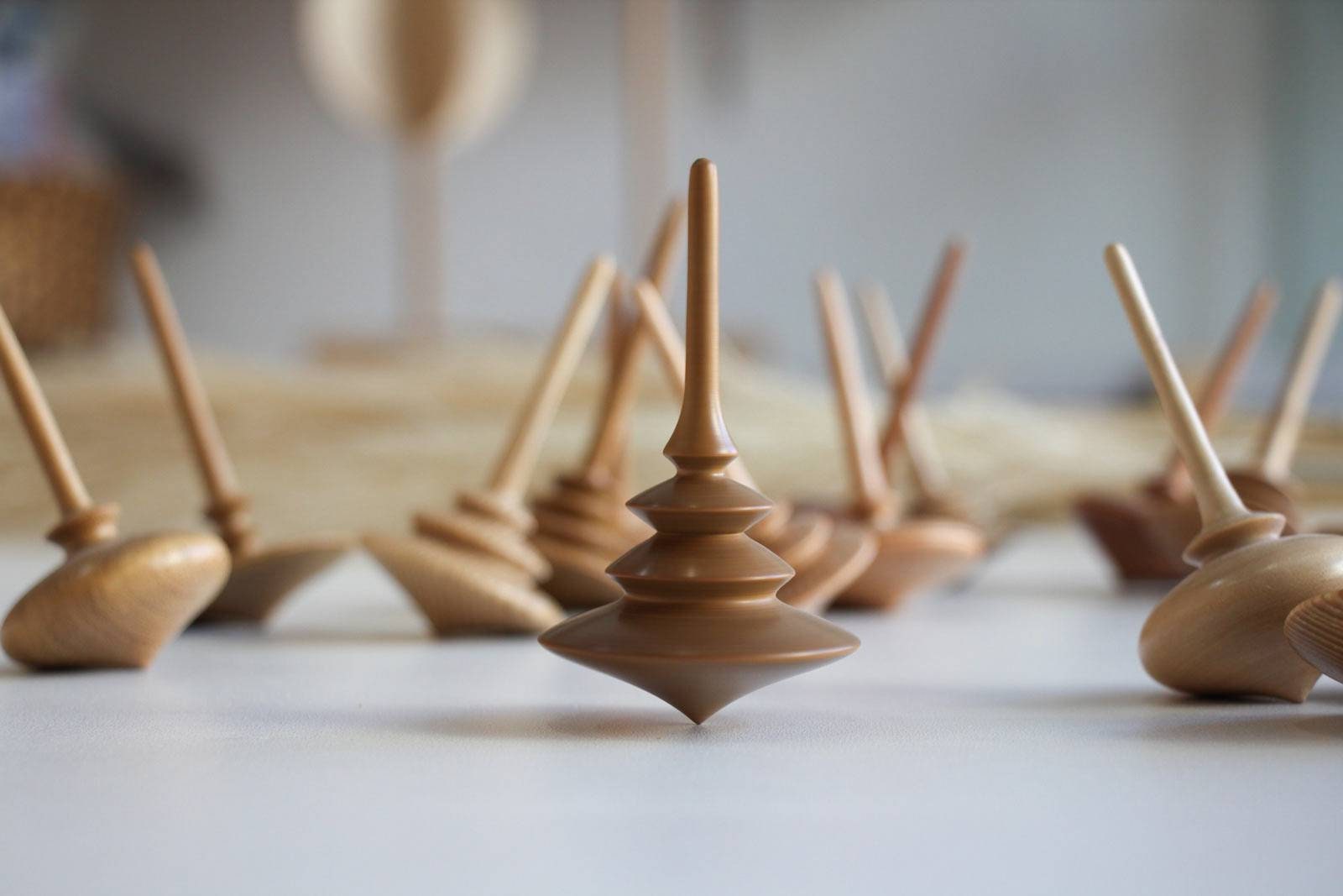 Handmade wooden spinning tops.