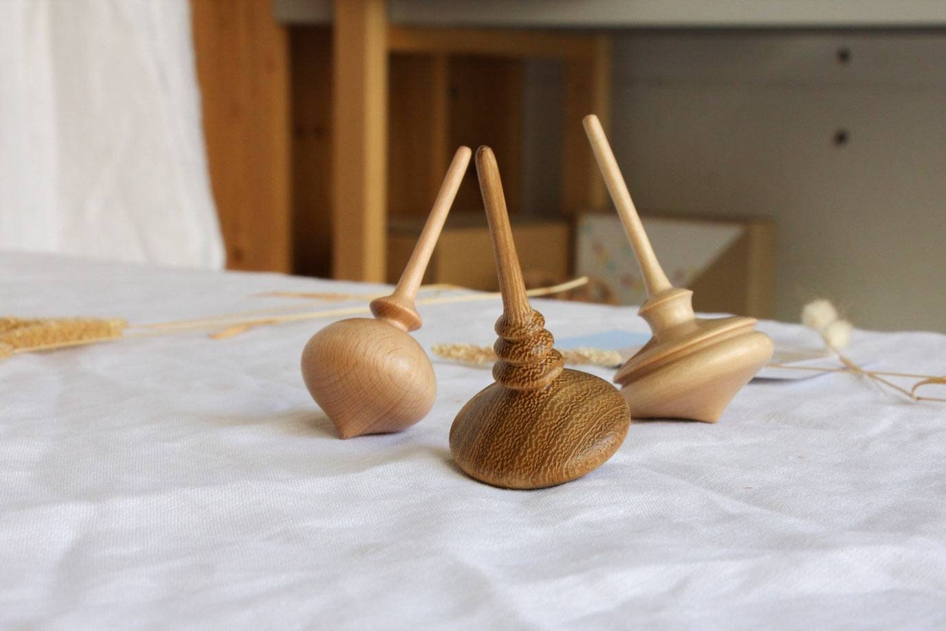 Handmade wooden spinning tops.