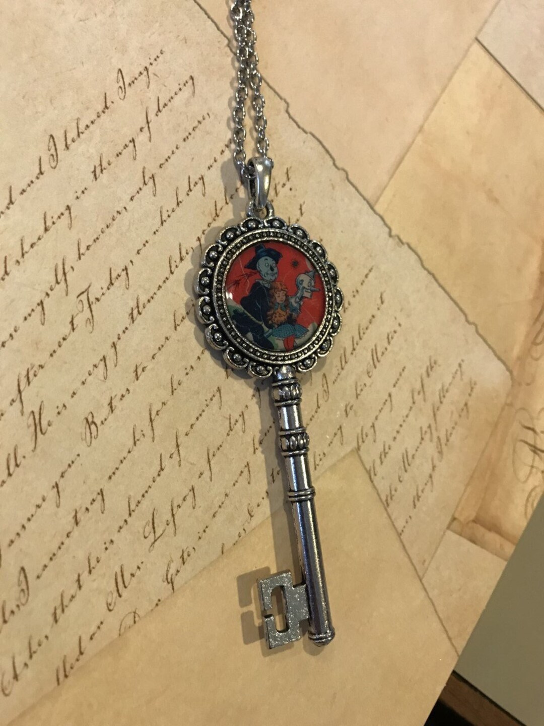 Wicked Wizard of Oz Tinman Scarecrow Key Pendant Necklace Literature ...