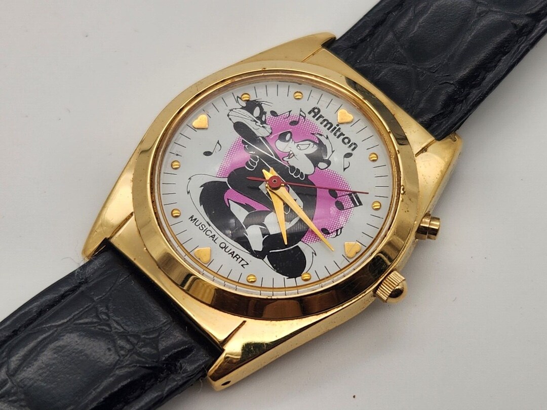 Vintage Armitron Pepe Le Pew Watch Unisex Gold Tone Musical Black Band ...