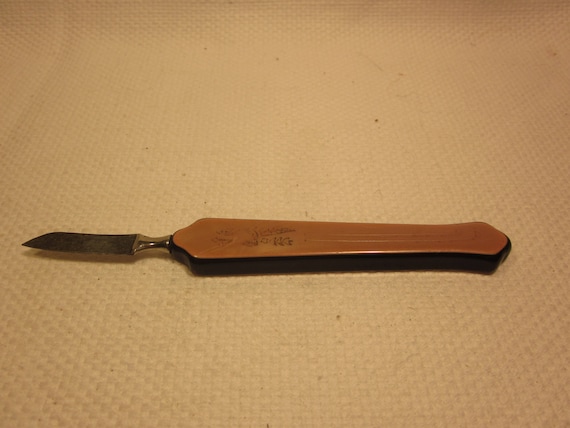 Vintage celluloid or bakelite handled manicure tool | Etsy