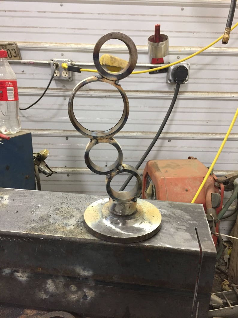 Metal cylinder sculpture | Etsy