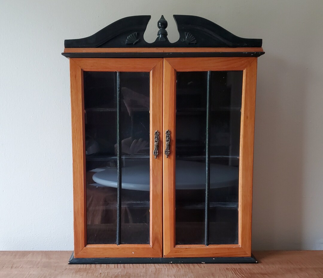 Hanging wall cabinet with glass doors store