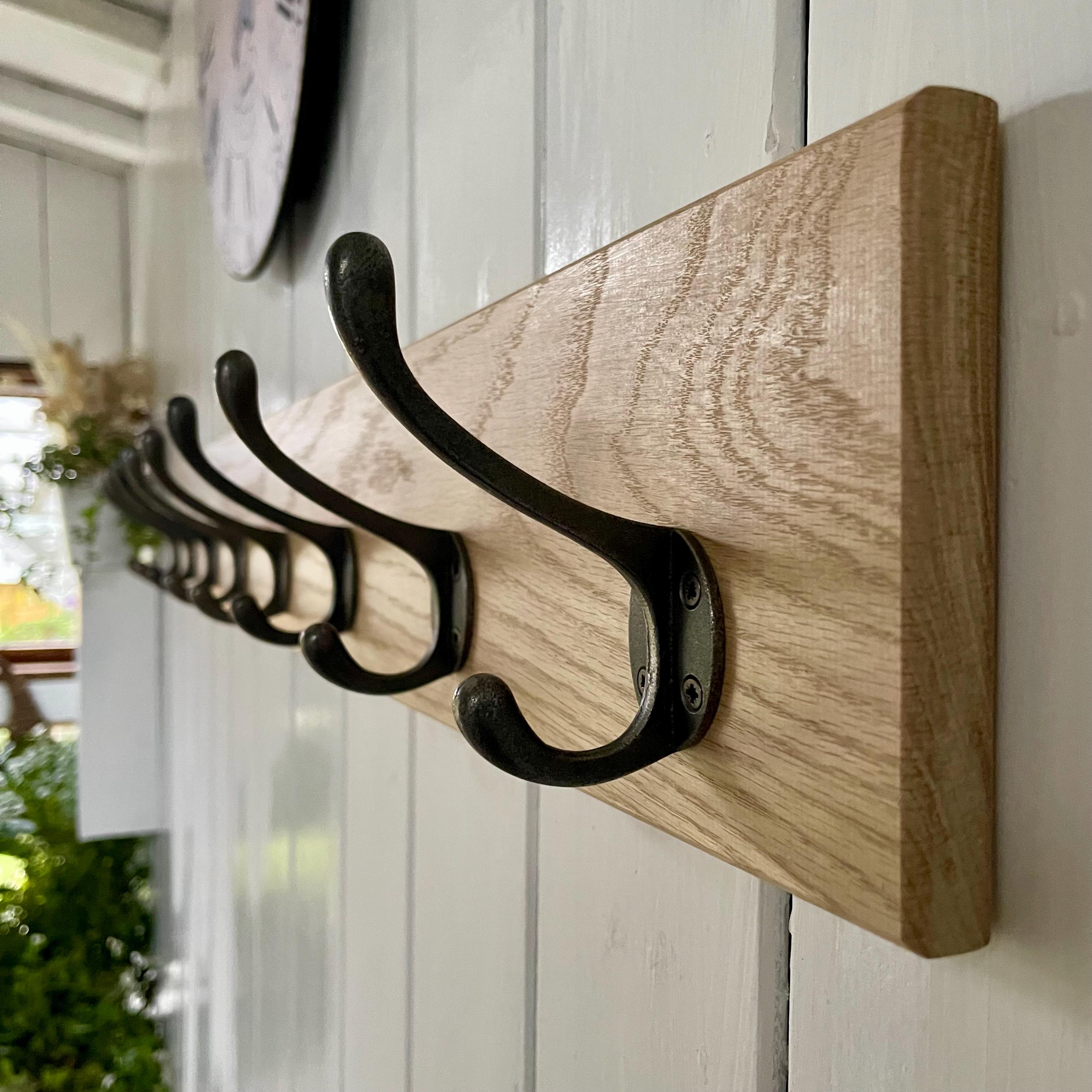 Cast iron and wood coat rack store