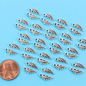 Tiny Angel Wing Charms - Double Sided Filigree Wings 13mm Long ...