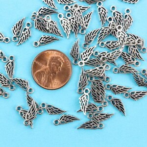 Tiny Angel Wing Charms - Double Sided Filigree Wings 13mm Long ...