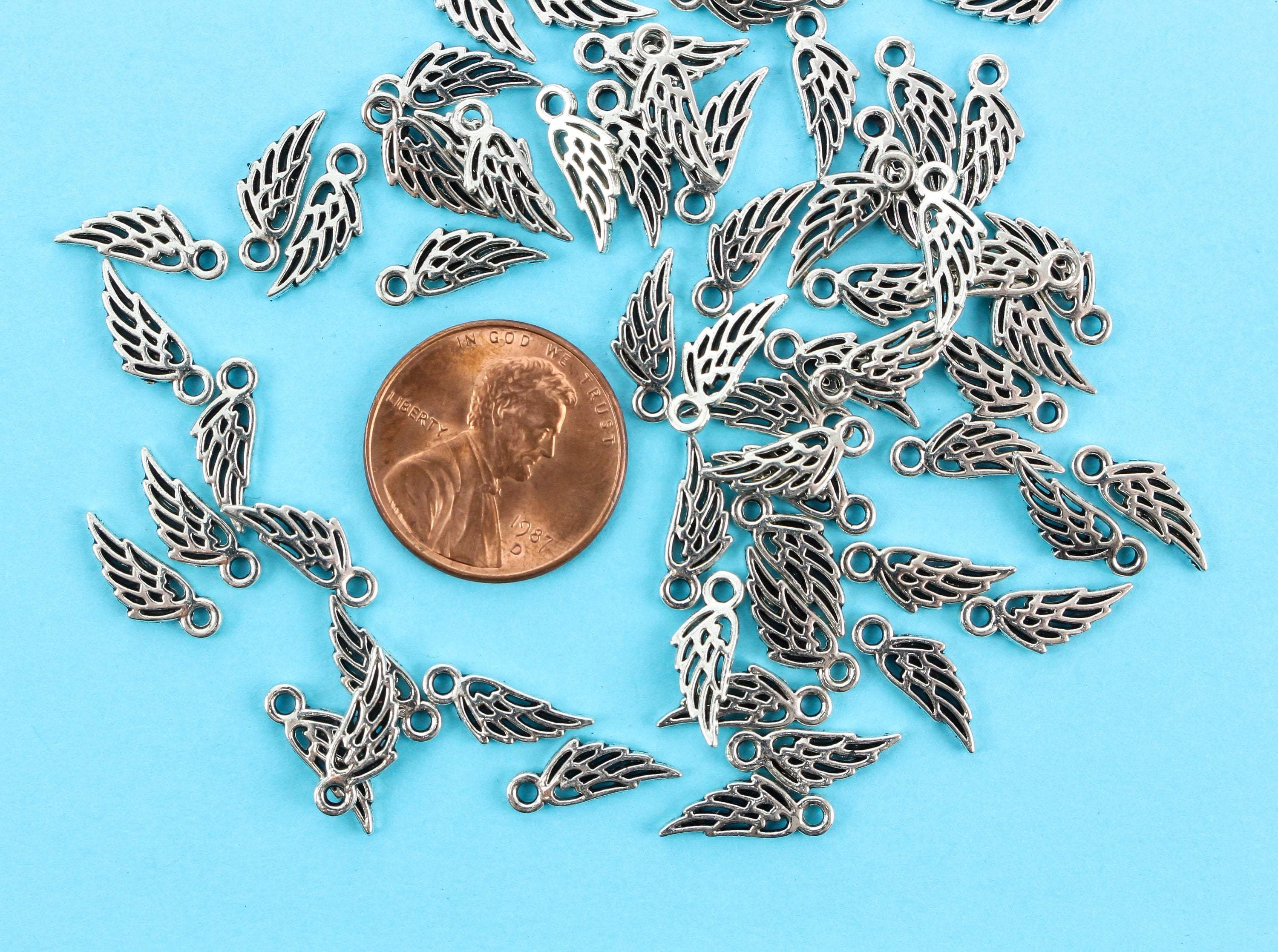 Tiny Angel Wing Charms Double Sided Filigree Wings 13mm long | Etsy
