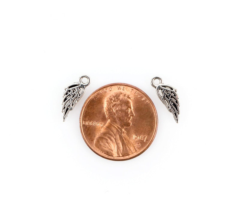 Tiny Angel Wing Charms Double Sided Filigree Wings 13mm Long - Etsy