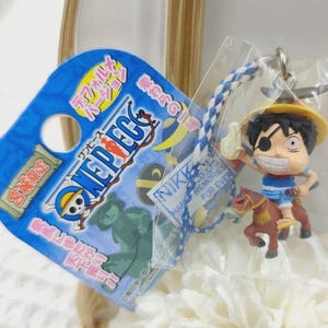 One Piece Monkey D. Luffy Riding His Beloved Horse Figure Strap ...