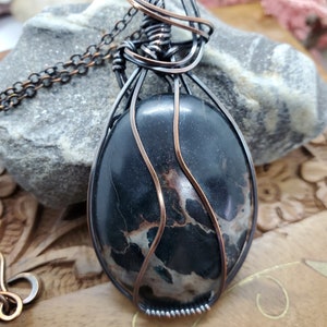 A Copper Wrapped Fossilized Palm Root Agate Pendant Necklace ...
