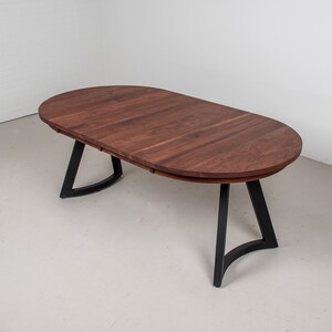 Round Expandable Dining Table, Spiced Walnut Table Top on Black Maple ...