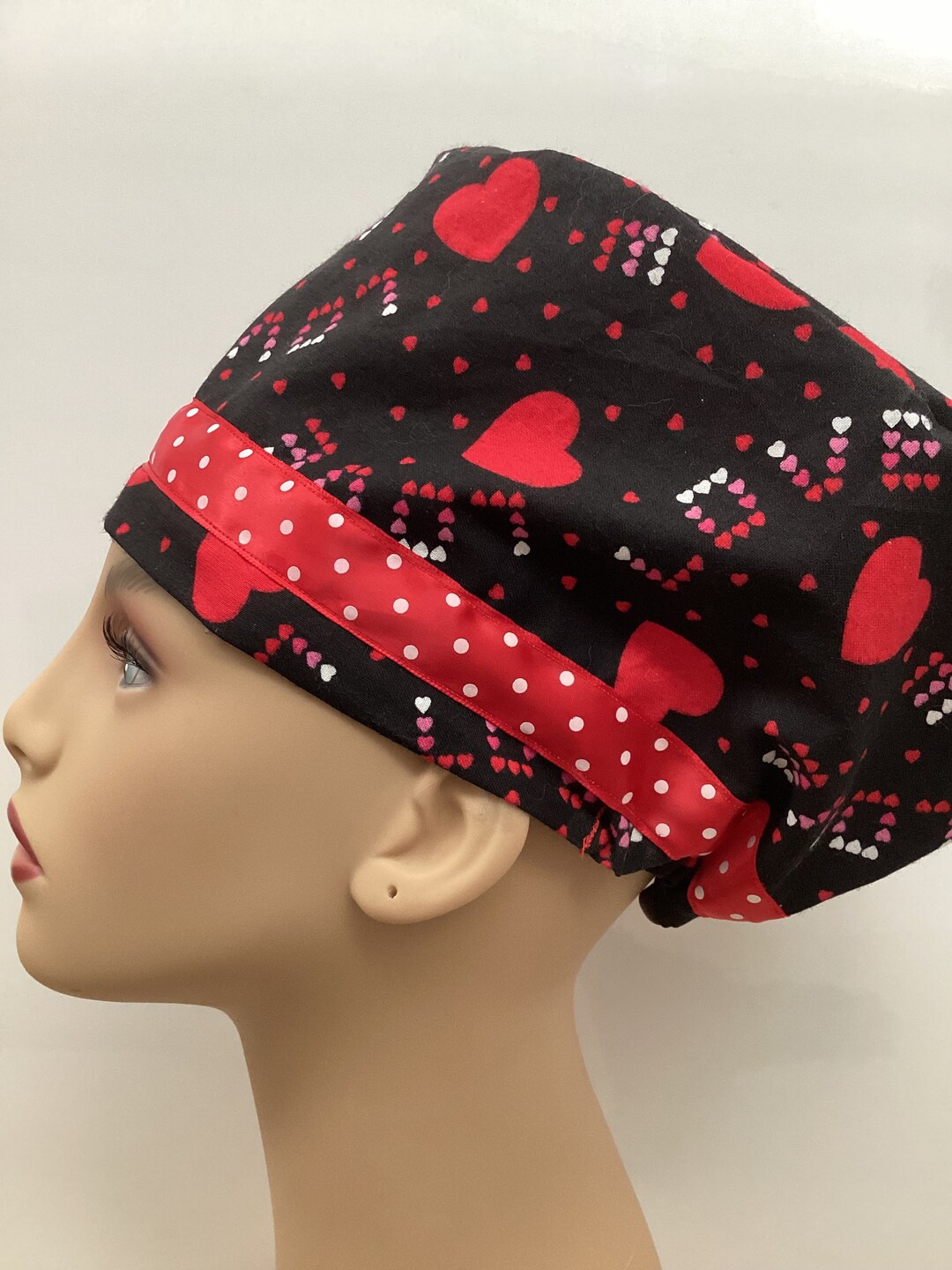 SCRUB CAP FEATURING a Bold, Colorful Print of Red Hearts and the Word ...
