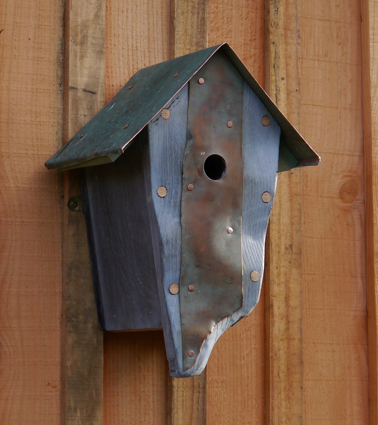 Handcarved Bird house with a copper roof | Etsy