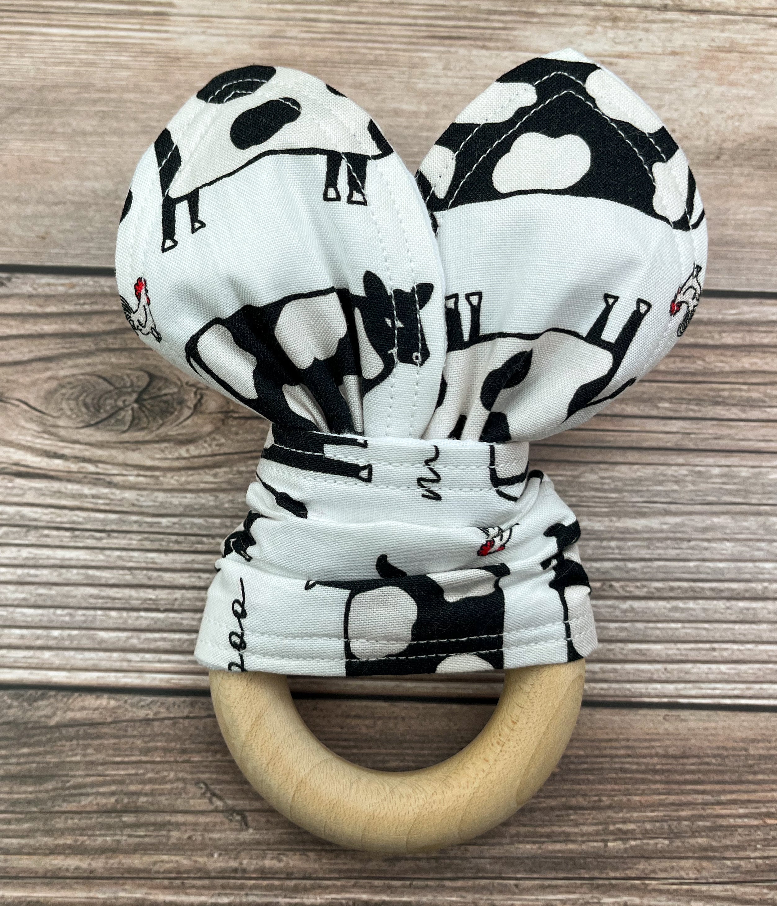 Plush Sensory Crinkle Cow Toy & Organic Wood Bunny Ear Teether Set ...