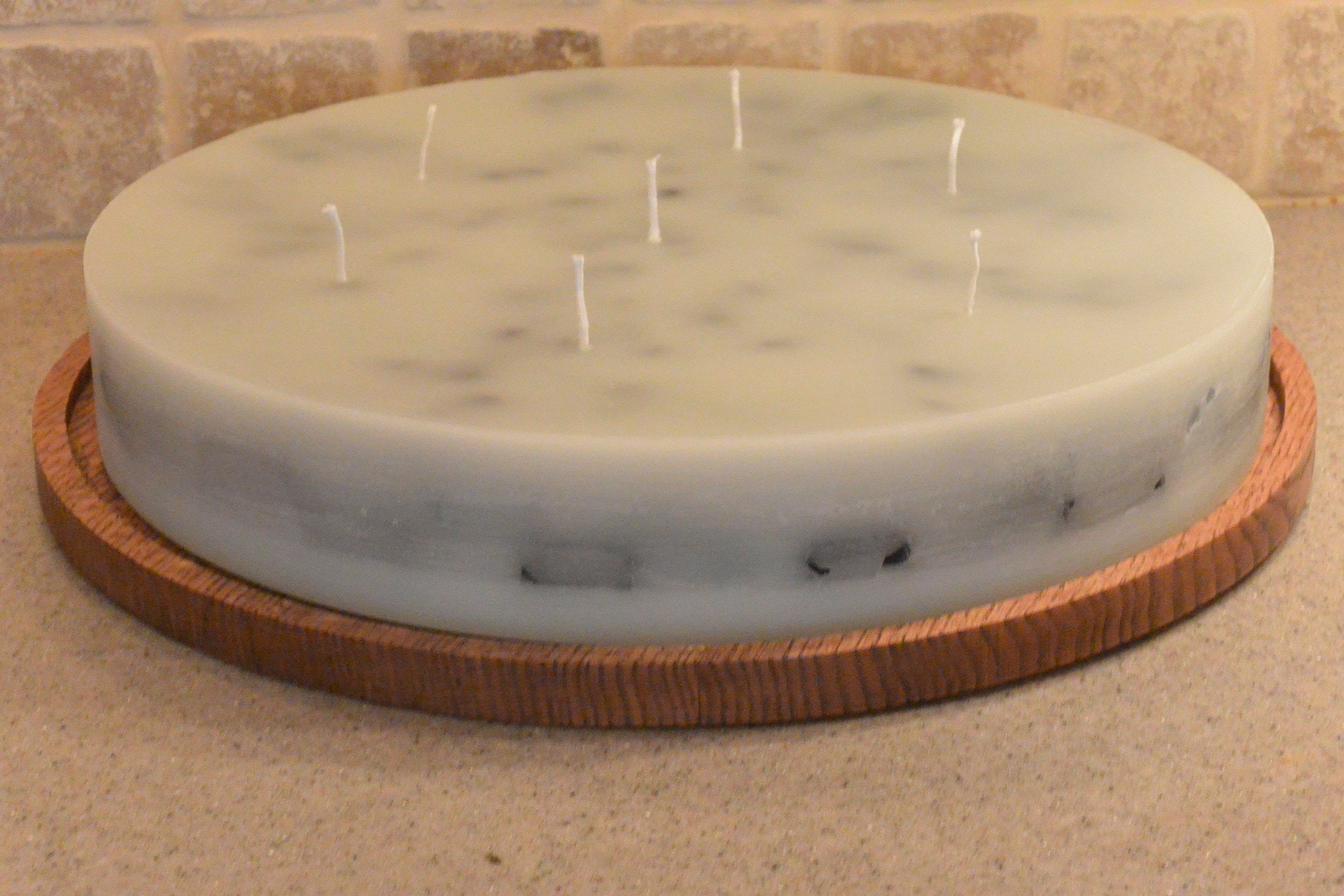 One of a kind 18 inch round candle with 7 wicks. Includes hand made oak ...