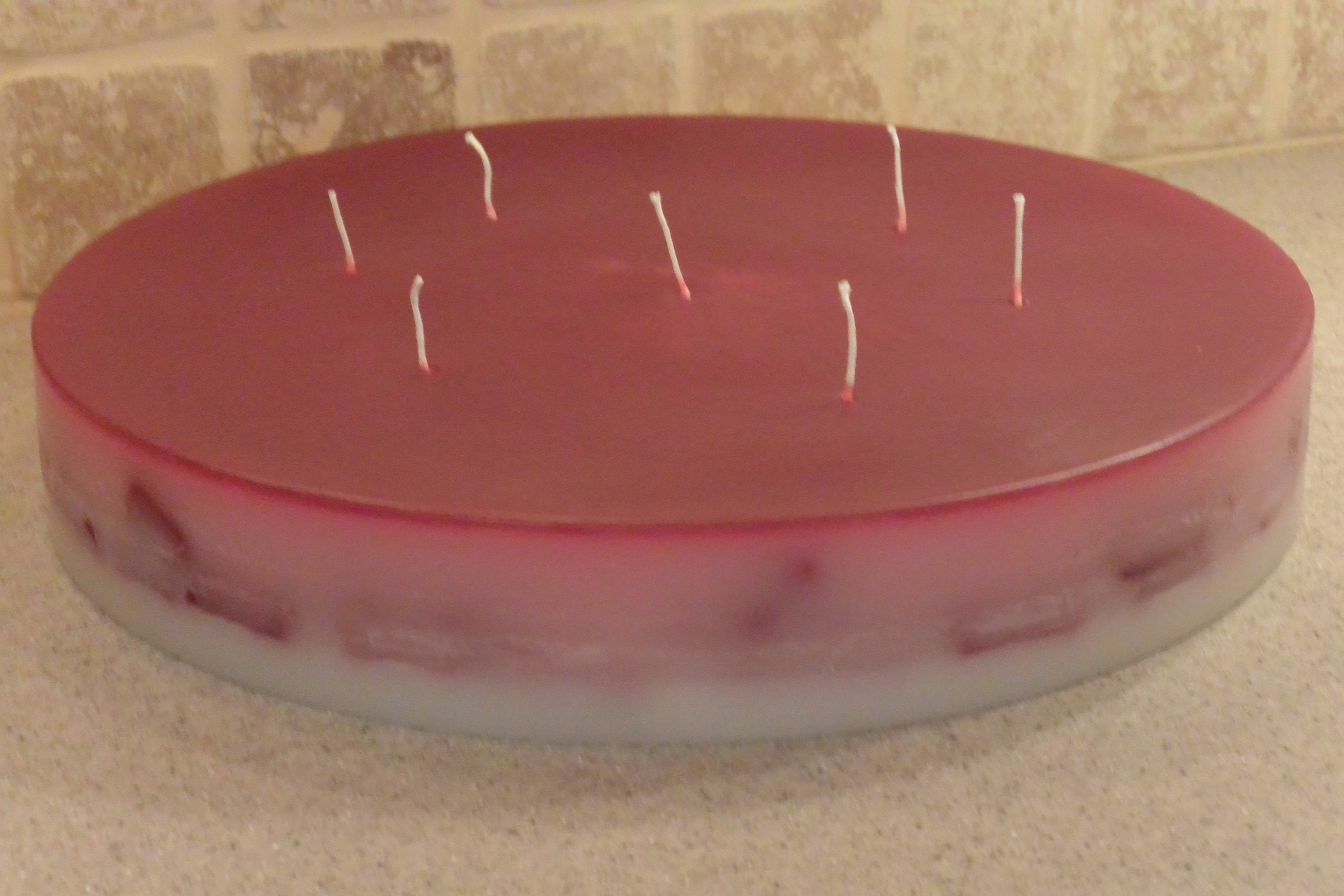 One of a kind 18 inch round candle with 7 wicks. Ships in 1 business day