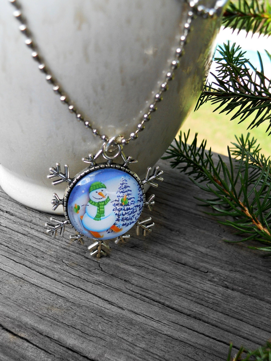 Skiing Snowman Pendant Necklace With Antique Silver Snowflake Bezel ...