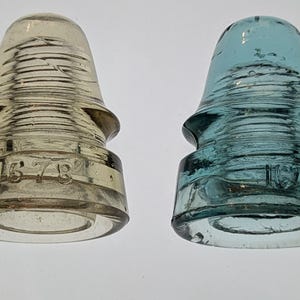 Two CD 162 Antique Glass Insulators Embossed 1678 Straw and Light Blue ...