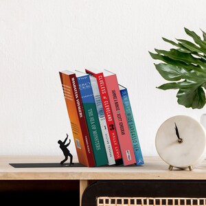 Falling Bookend – Unique Metal Book Holder | Minimalist Bookshelf Decor | Black Iron Bookend ...