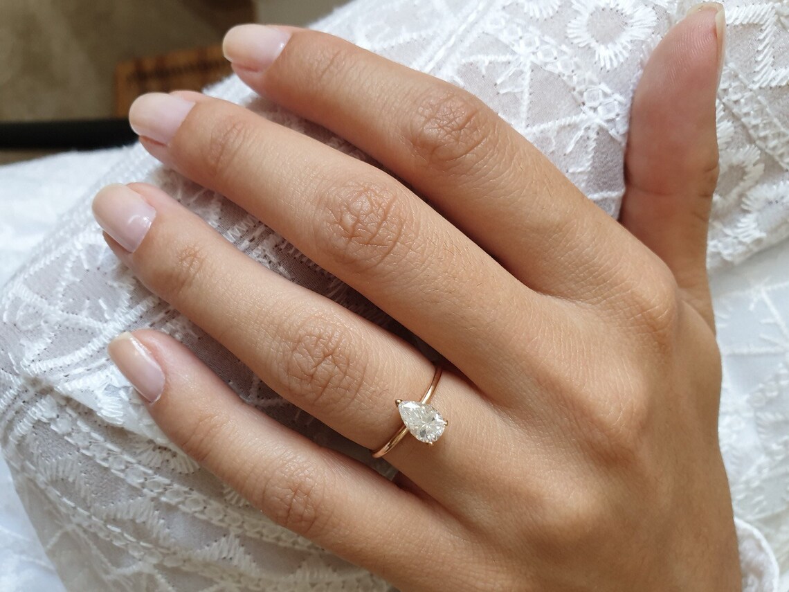 Simple solitaire pear shape engagement rings - panaindustry