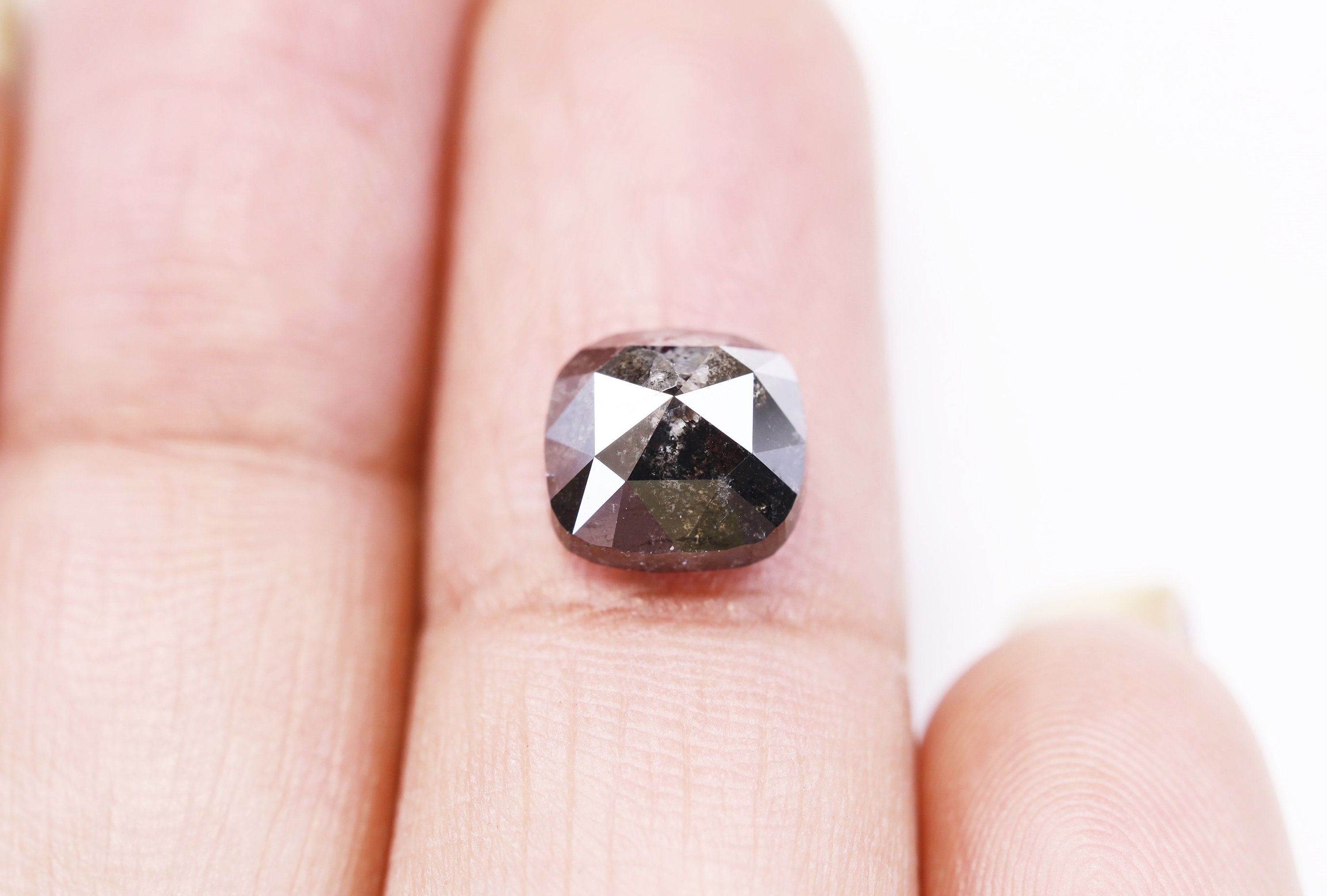 1.99 Ct, 6.9 X 6.6 X 4.6 MM, Natural Faceted Black Color 1.99 Ct, 6.9 X 6.6 X 4.6 MM, Natural Faceted Black Color