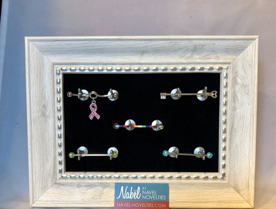 Navel Novelties Uses Special Nabel Latches to Display Your Navel ...