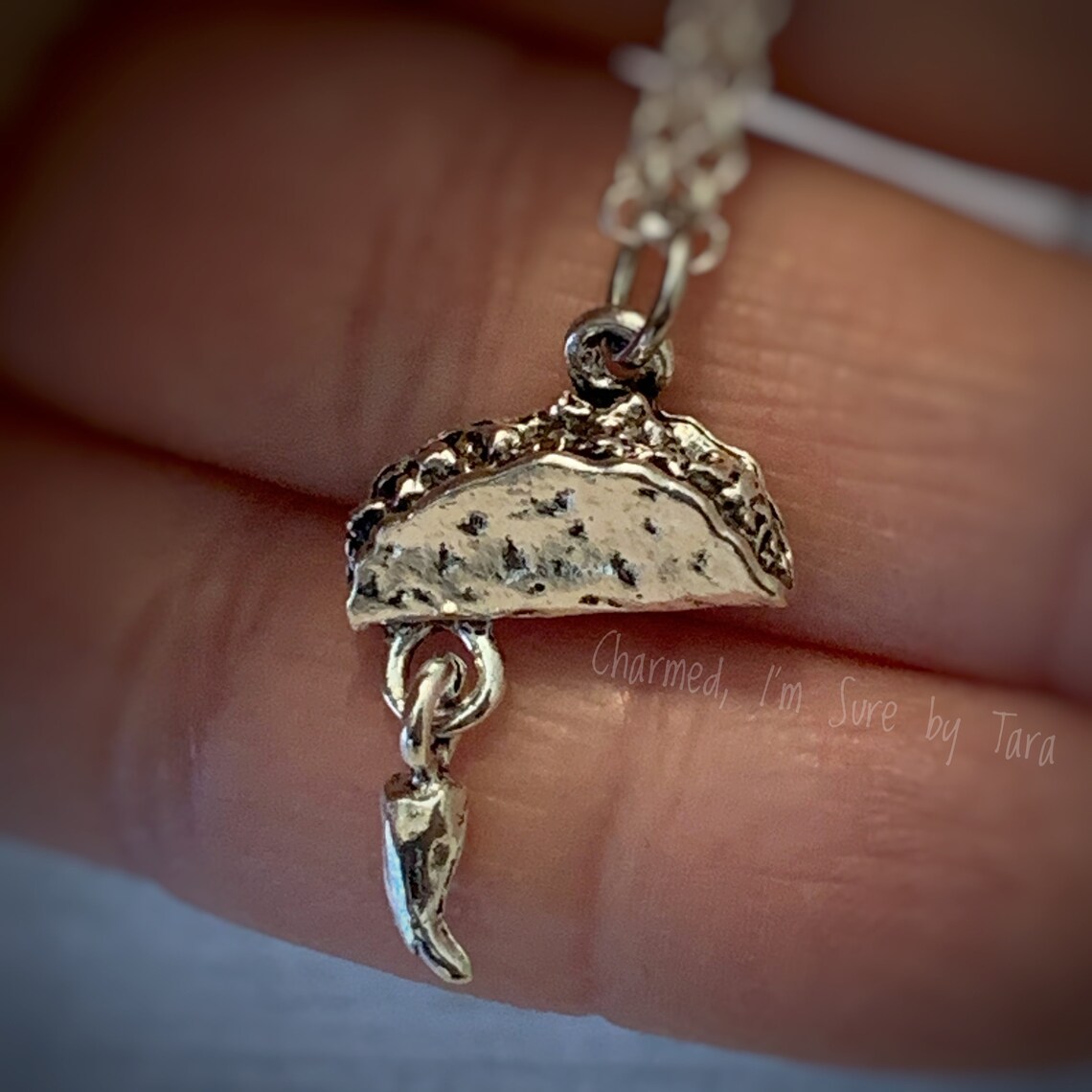 Taco charm necklace with dangling jalapeño pepper. | Etsy