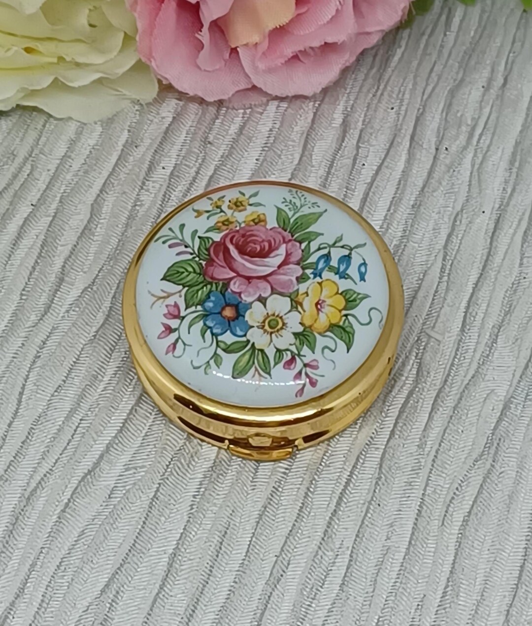 Kigu Pill Box With a White Ceramic Disc Decoated With Pink Blue Yellow ...