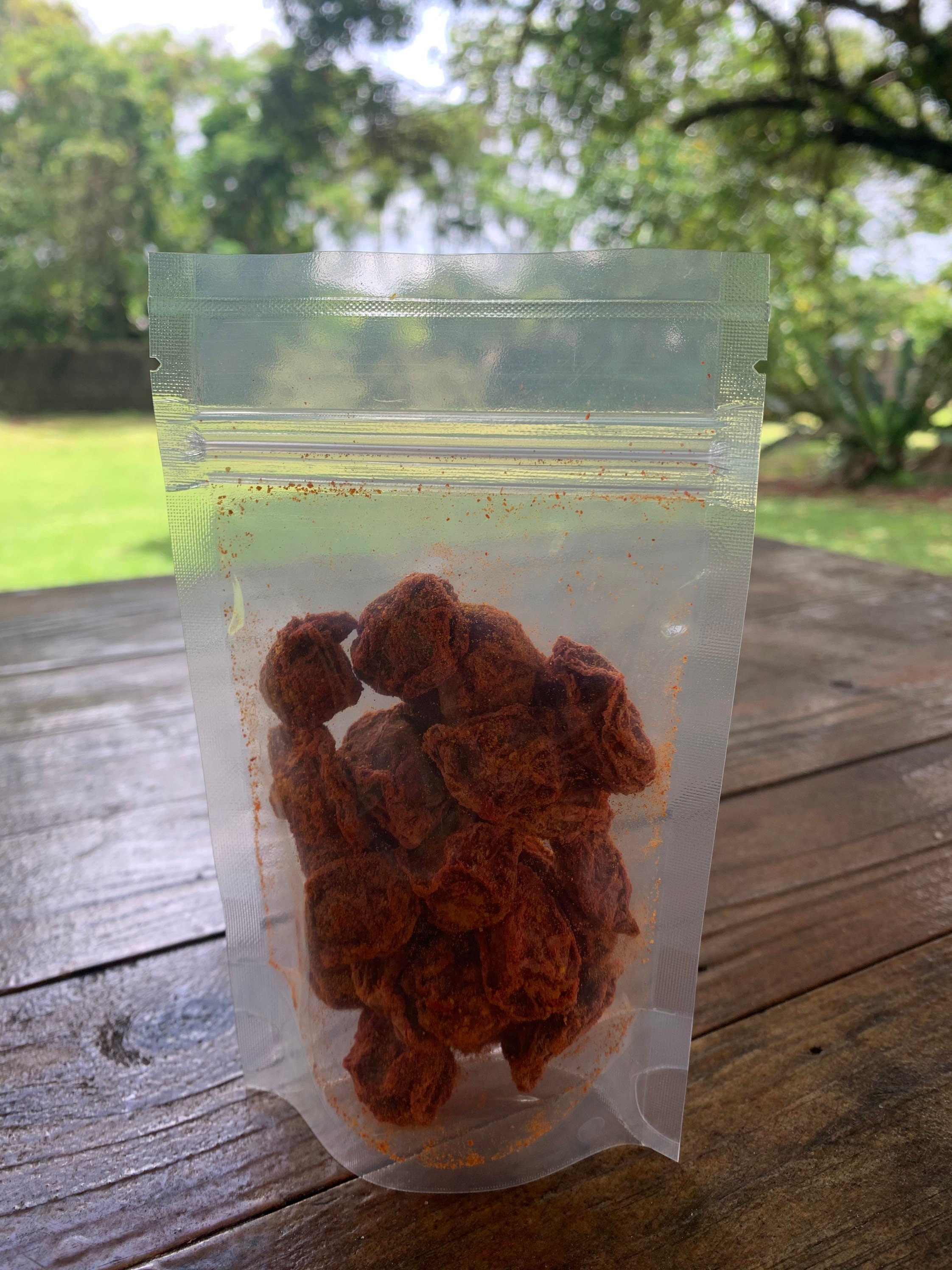 Spicy Sweet and Sour Kiamoy Champuy With Guam Boonie Pepper Powder. Add ...
