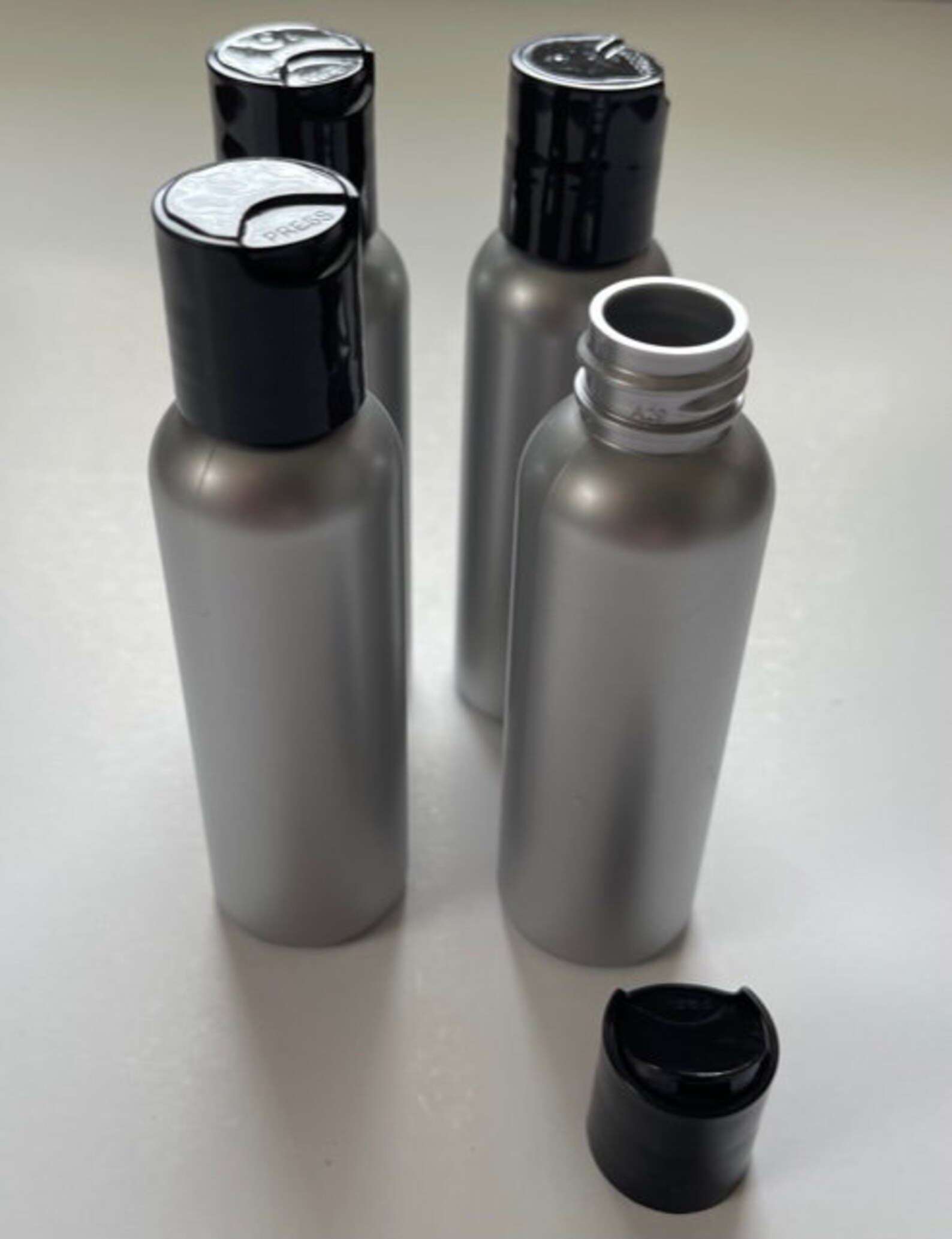 2 Oz. Silver PET Plastic Bottles With Black Disk Dispensing - Etsy