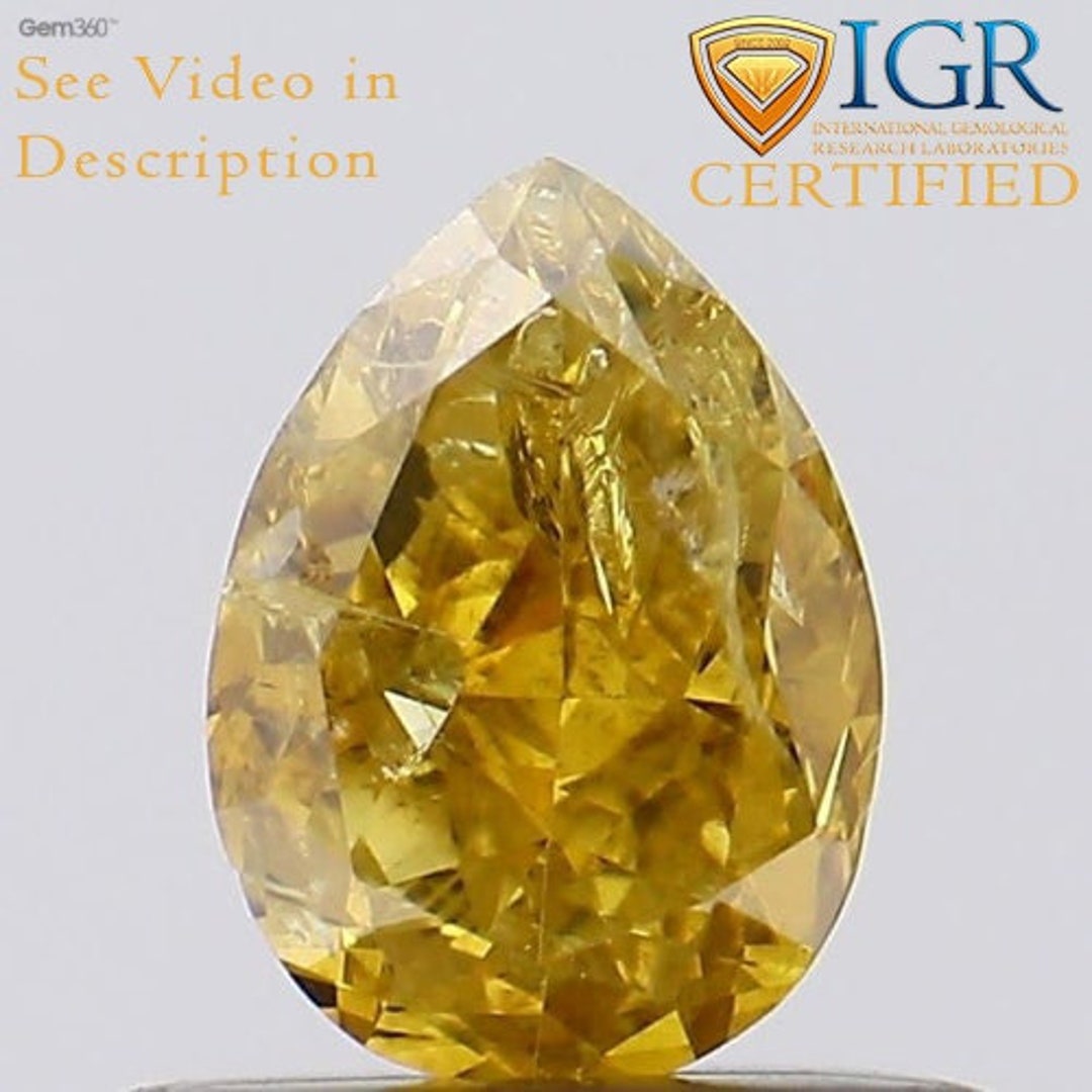 0.53 Cts. CERTIFIED Modified Pear Cut SI3 Vivid Golden Orange Color ...