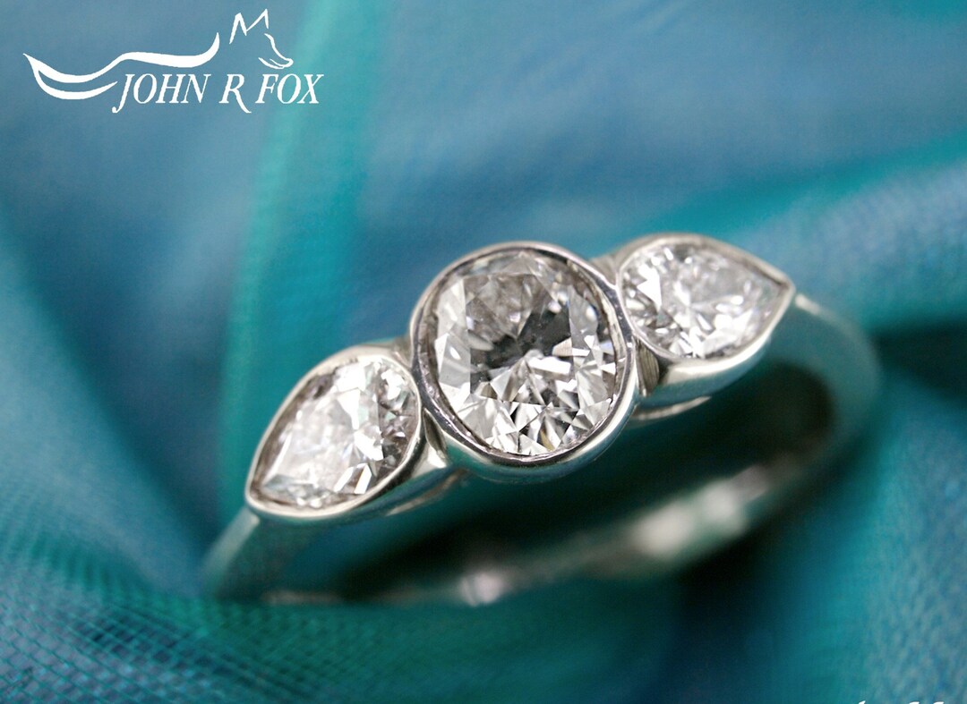Oval and Pear Shaped Diamond Ring. - Etsy