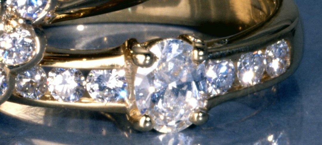 Oval Diamond Bezel Set Ring With Channel Set Diamonds by John R. Fox - Etsy