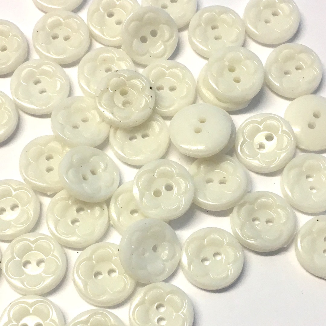20 X 13mm White Plastic Buttons With an Etched Flower and Two Holes ...