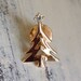 Vintage Avon Christmas Tree Holiday Pin Brooch Clear Rhinestone Star ...