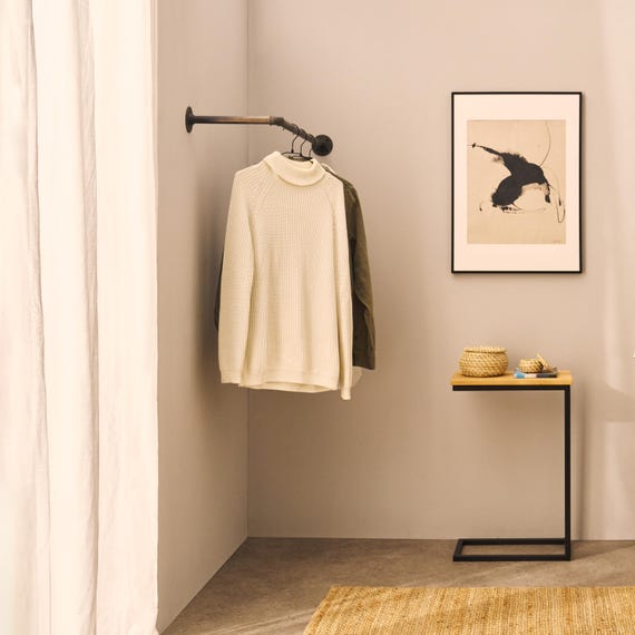 Corner coat hanger store
