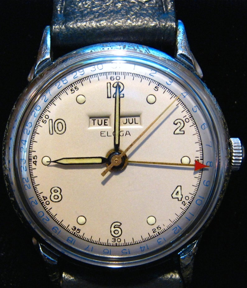 Vintage & Rare 1940's ELOGA 'triple Date' Wristwatch - Etsy