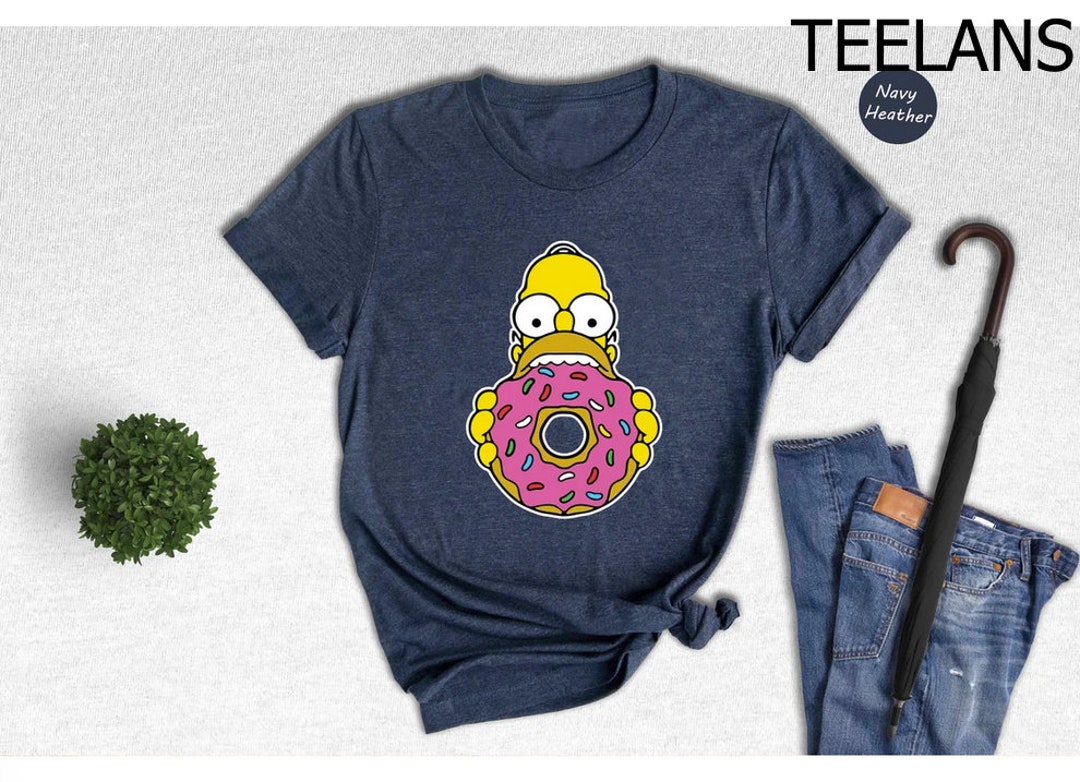Indulge in Nostalgia: Pocket Homer Simpson Eating Donut Shirt Perfect ...