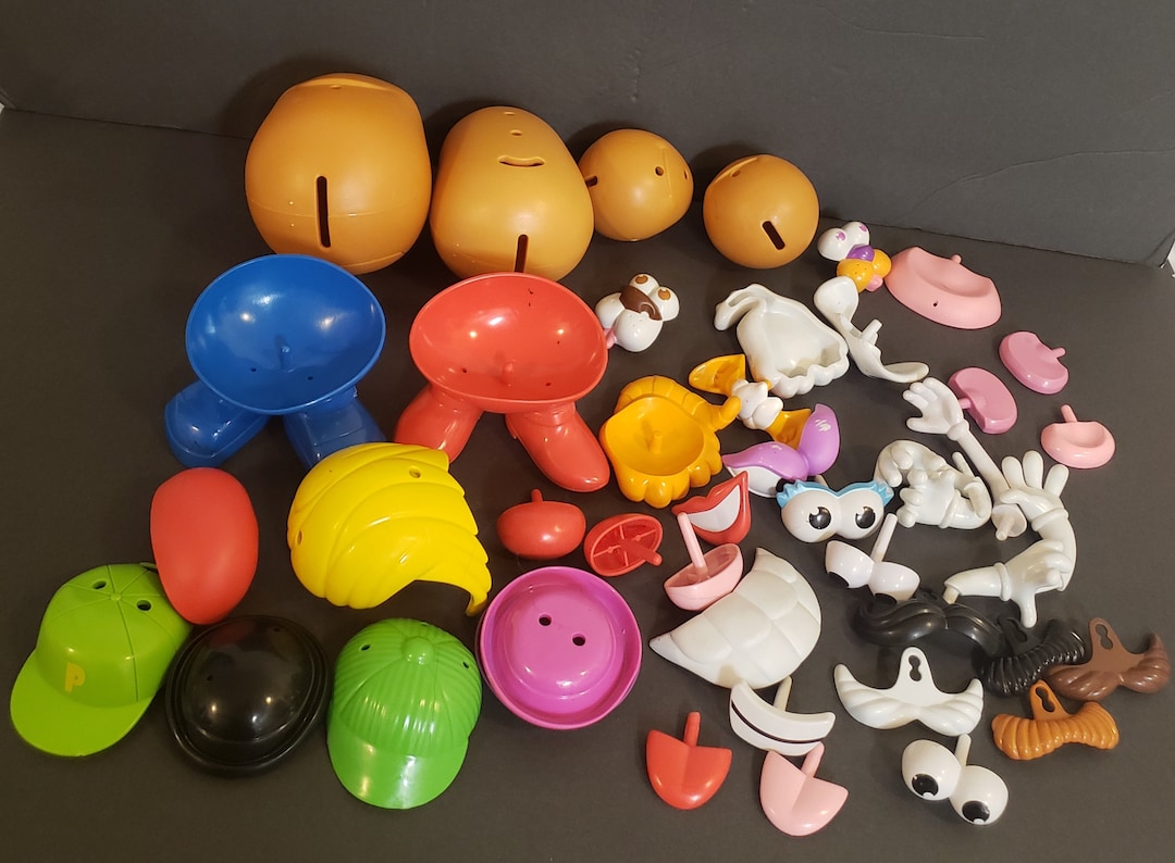 Playskool Assorted Mr. and Mrs. Potato Heads and Accessories 44 Pieces ...