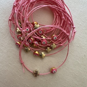 25 Baptism Martyrika Witness Bracelets Gold Cross & Pink Evil Eye Bead ...