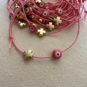25 Baptism Martyrika Witness Bracelets Gold Cross & Pink Evil Eye Bead ...