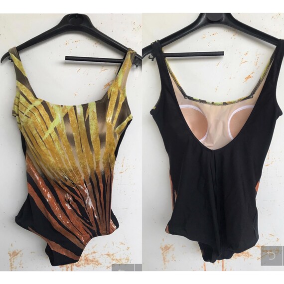 One piece 90s vintage swimsuit that features tribal, … - Gem