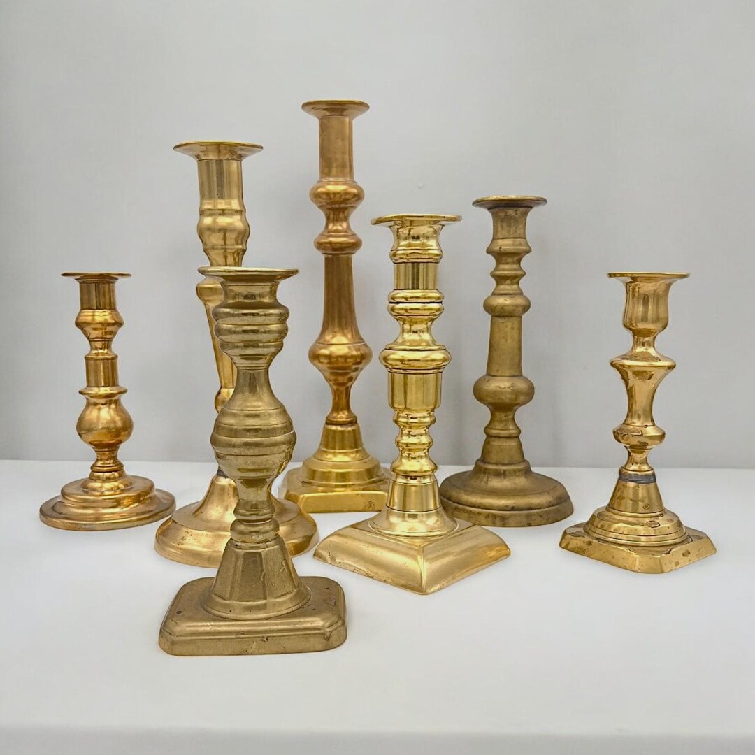 Group of English Brass Candlesticks. LOT OF 7, Comprising Baluster-form ...