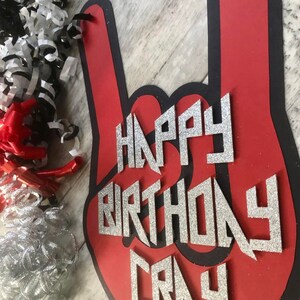 One Rocks Born to Rock Free Tattoos Pour Some Sugar Rock Hand Table ...