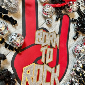 One Rocks Born to Rock Free Tattoos Pour Some Sugar Rock Hand Table ...