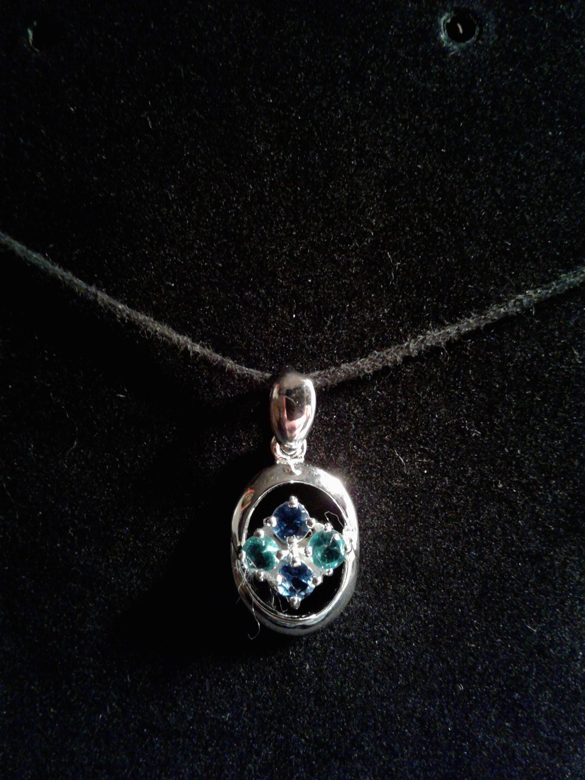 Sterling Silver Oval Pendant With Light and Dark Blue Sterling Silver Oval Pendant With Light and Dark Blue