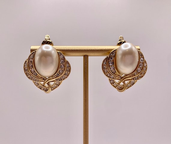 Trifari gold clip on earrings store