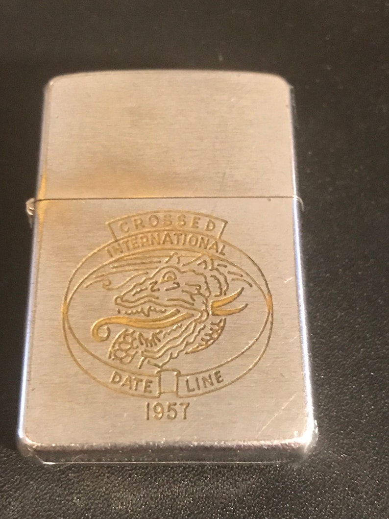 Crossed International Date Line Zippo Full Size Lighter Used dated 1957 ...