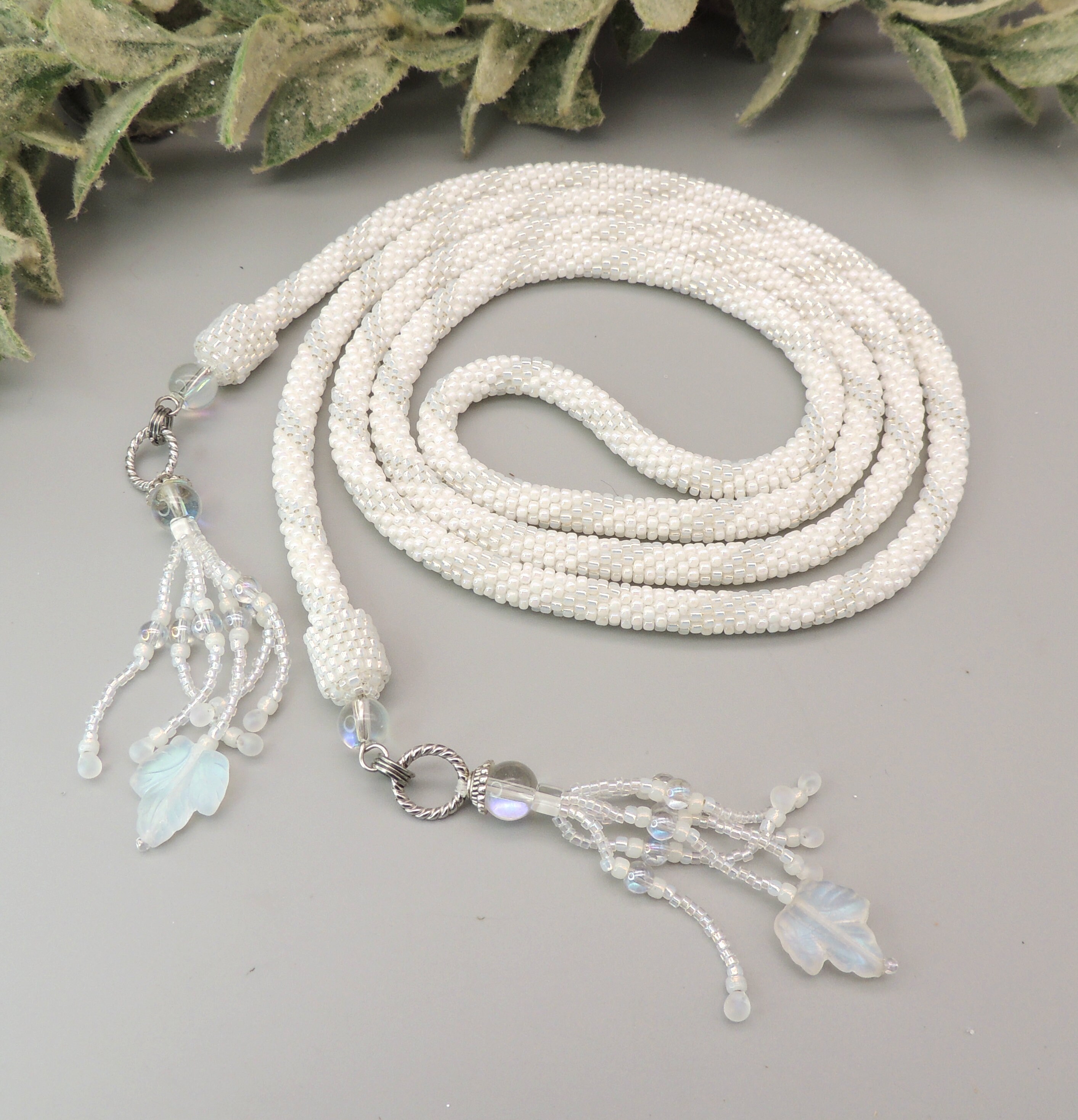White Bead Crochet Lariat With Aurora Borealis and Glass Leaf Accent ...